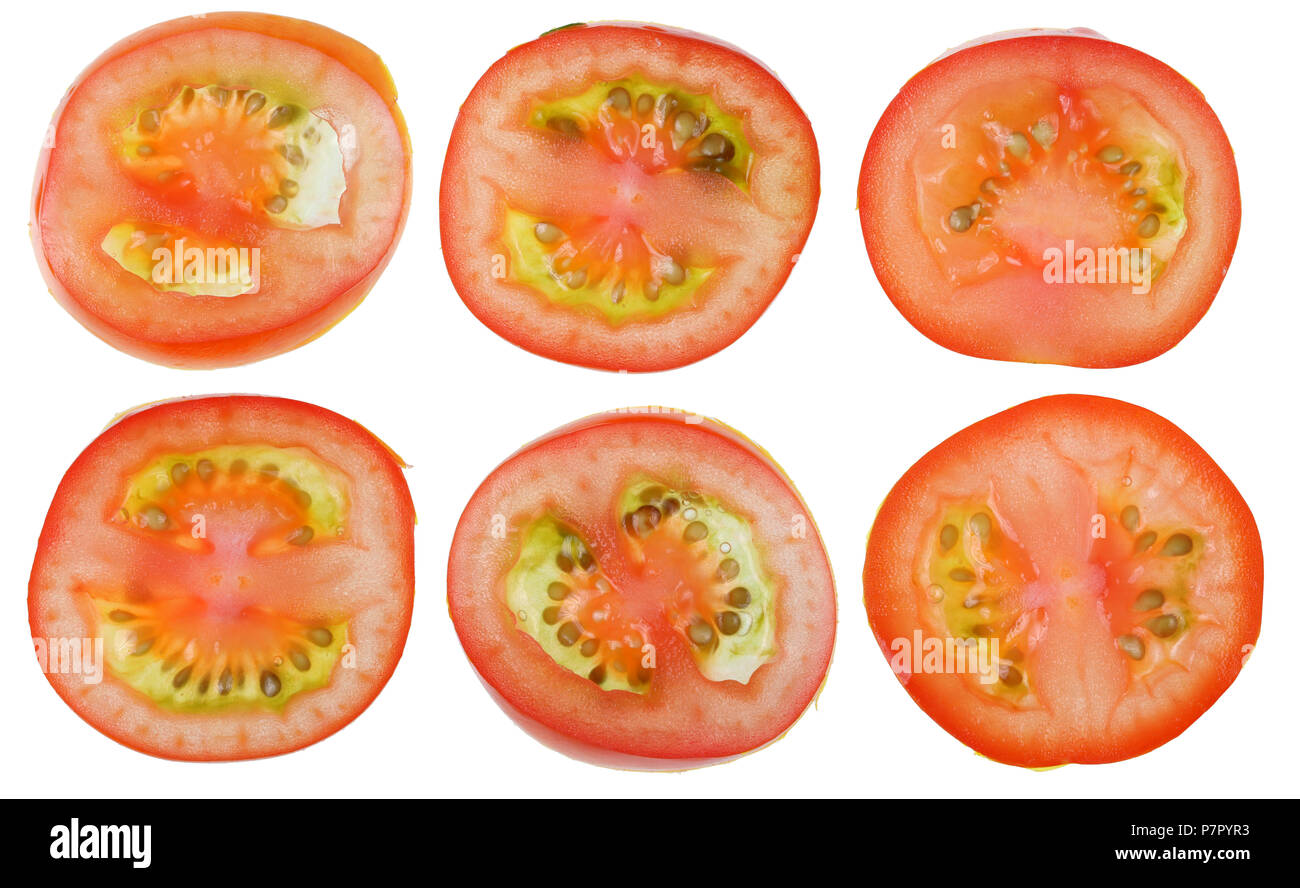 Cross sections of small cherry tomatoes. Isolated on white studio macro ...