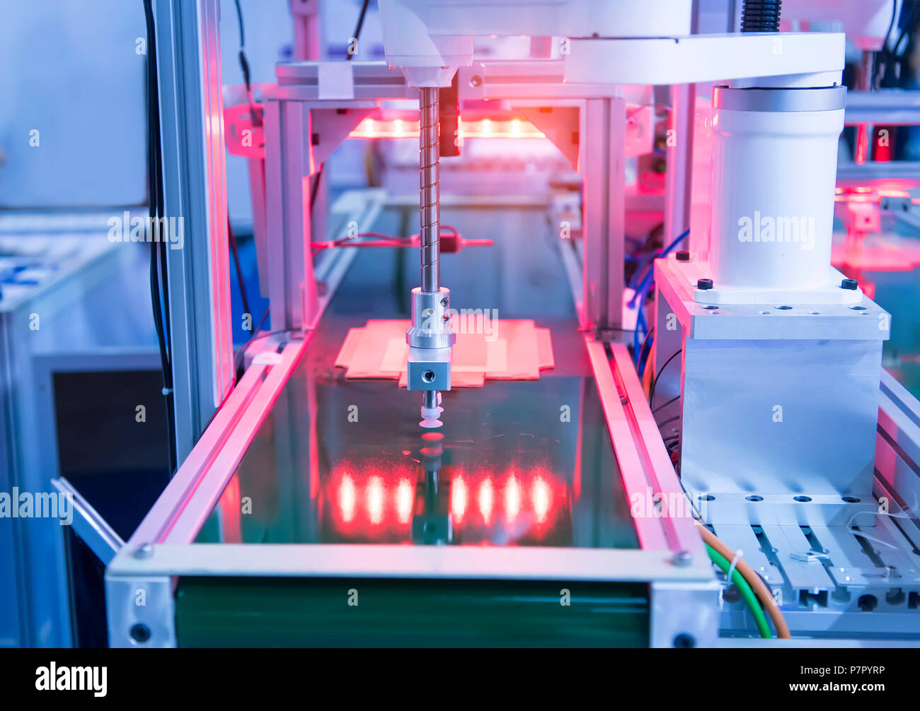 Automatic robot in assembly line working in factory. Smart factory ...