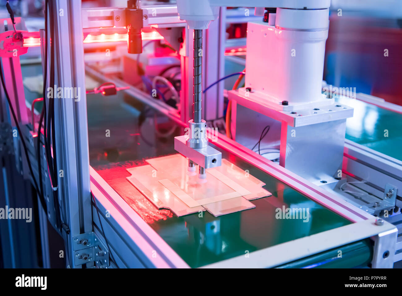 Automatic robot in assembly line working in factory. Smart factory ...