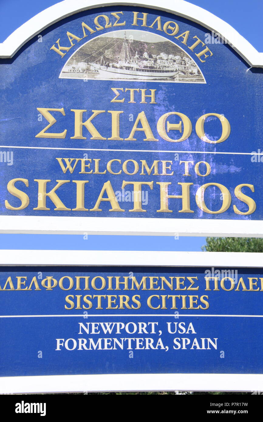 Greek signage welcoming tourists, visitors and holidaymakers to ...