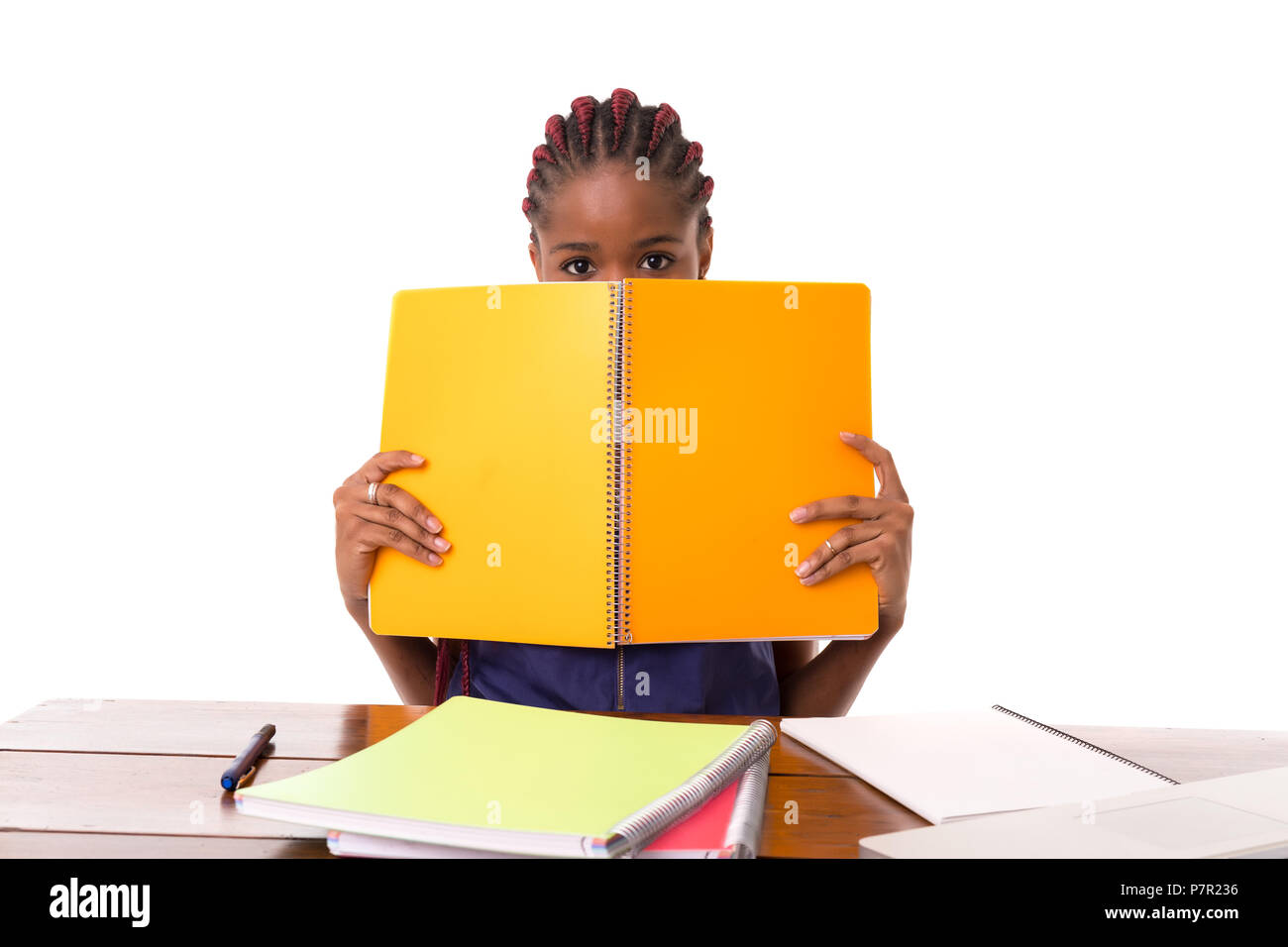 Beautiful african student woman posing isolated over white background ...