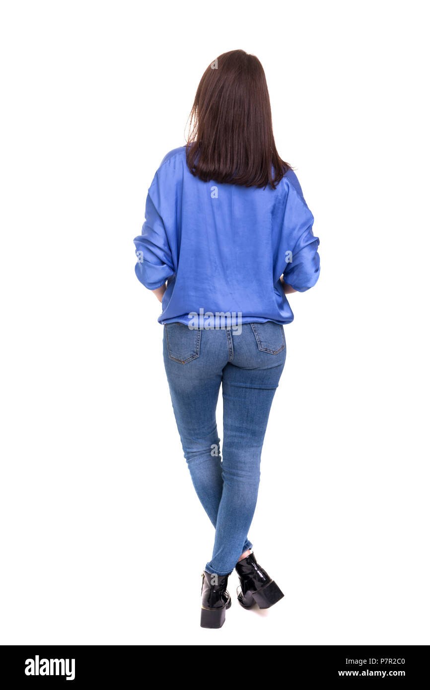 Woman posing with her back faced to camera, isolated over copy space ...