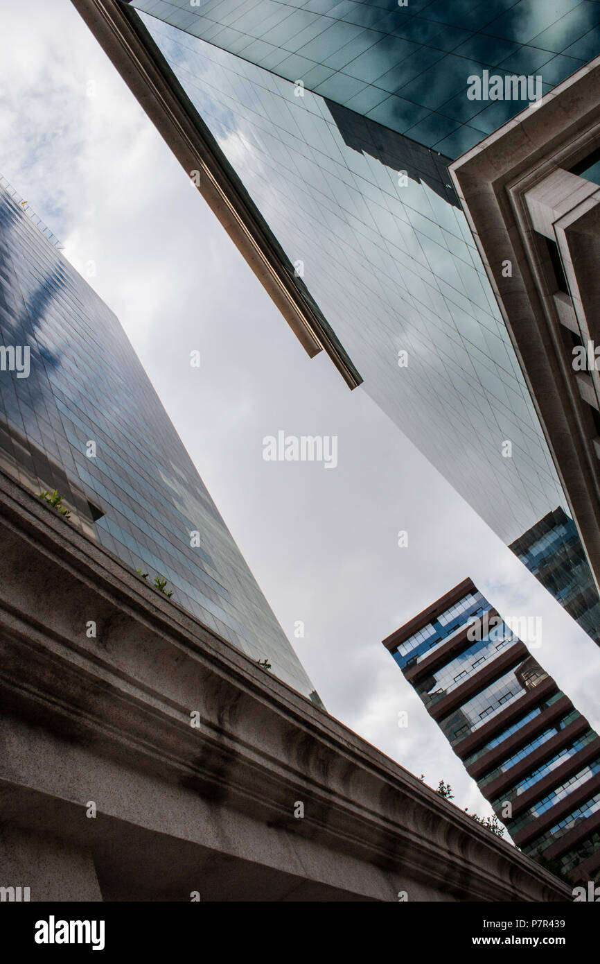 Business buildings makes a corridor of glass Stock Photo - Alamy