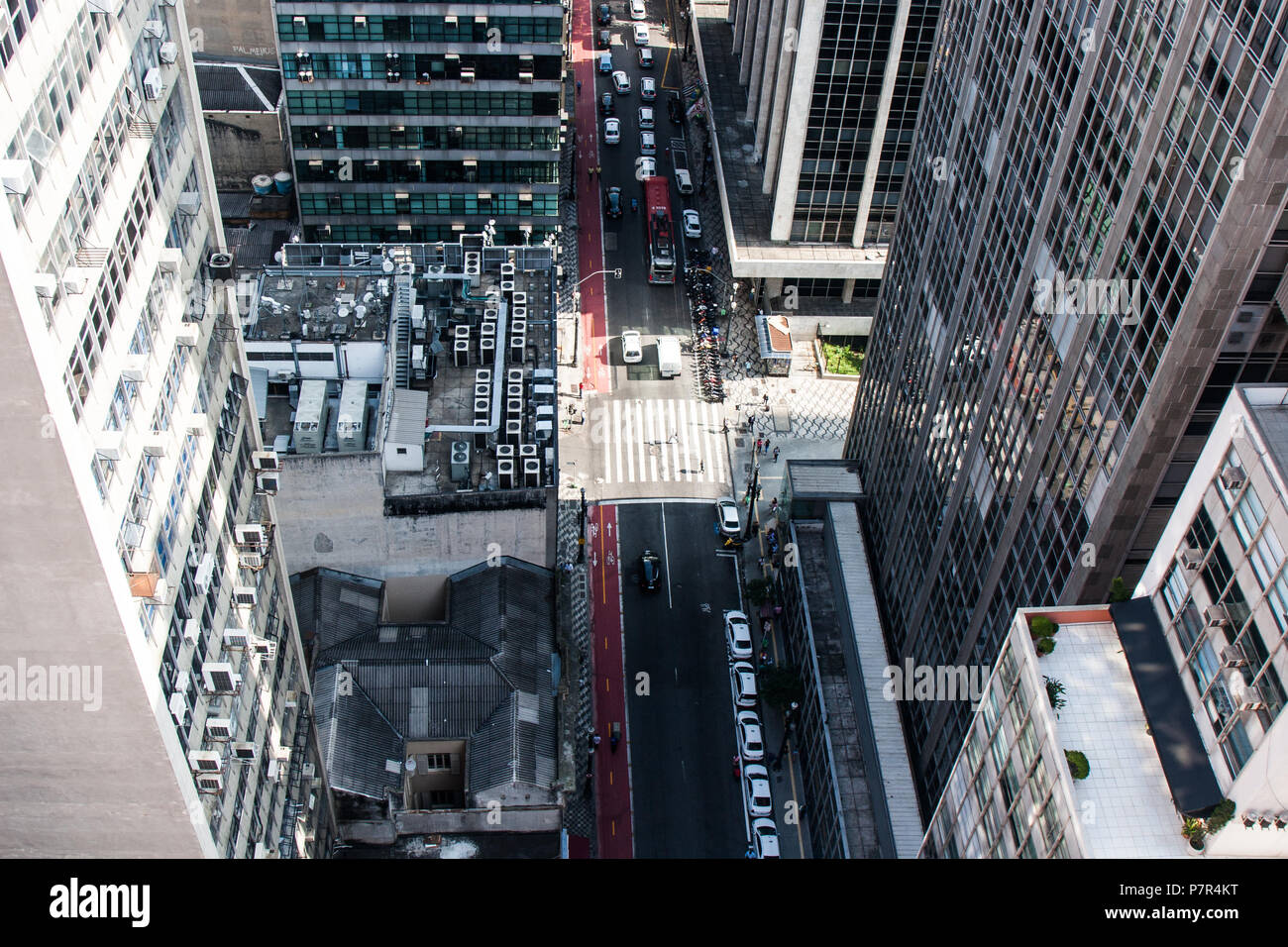 High view of a street surrounded by business buildings in downtown ...