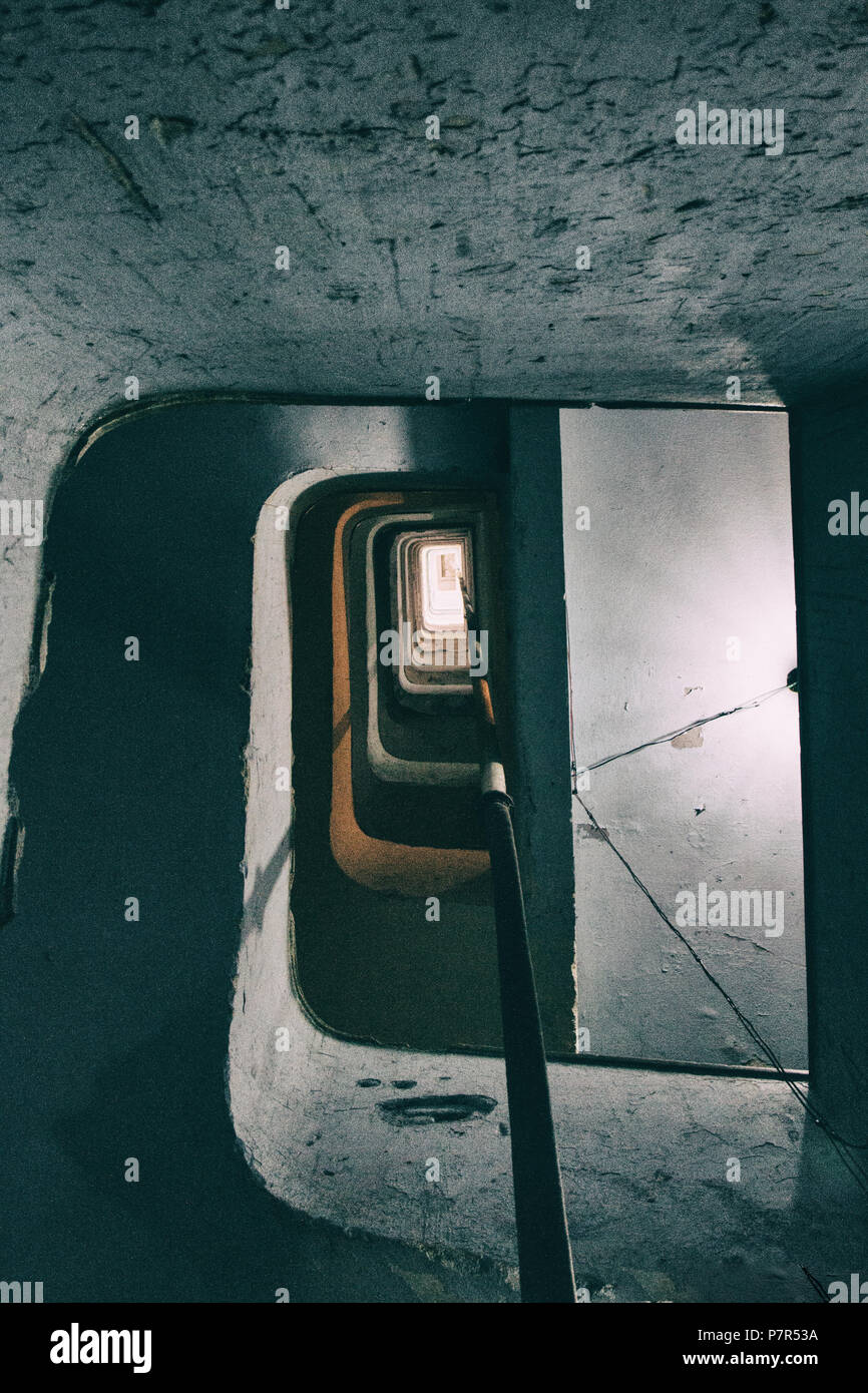 Dangerous spiral stairs in an eroded old building Stock Photo - Alamy