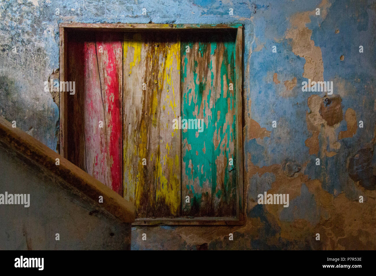 Rotten internal green, yellow and red wood window Stock Photo - Alamy