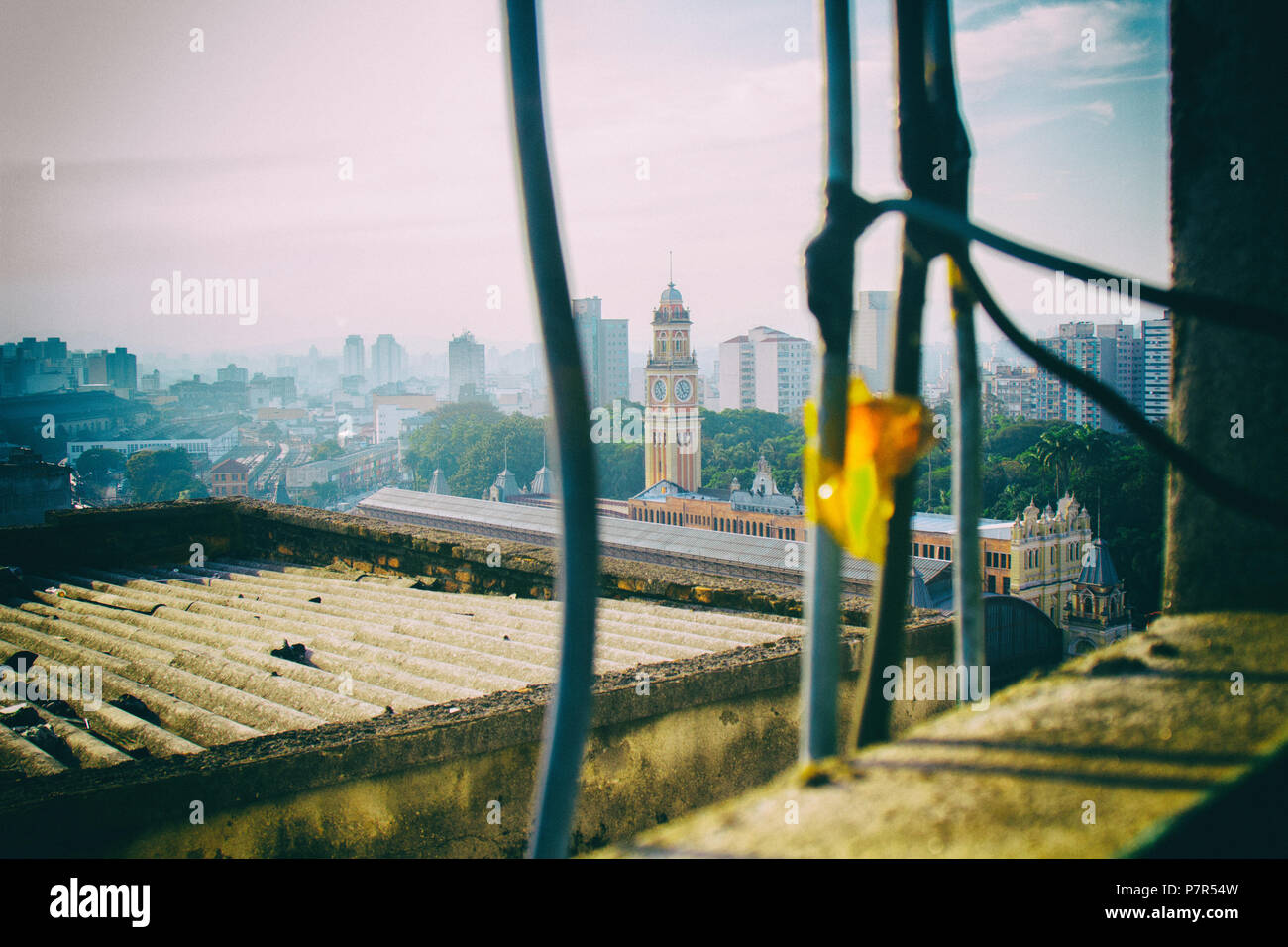 View of the skyline of the metropolis from a dacayed window Stock Photo ...