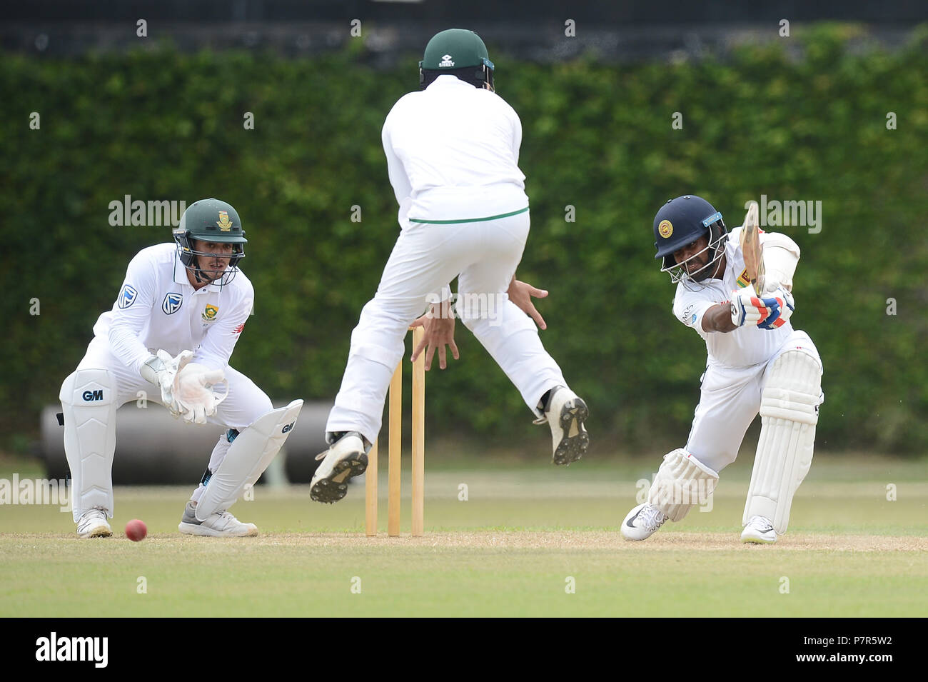 Playing cover drive hi-res stock photography and images - Alamy