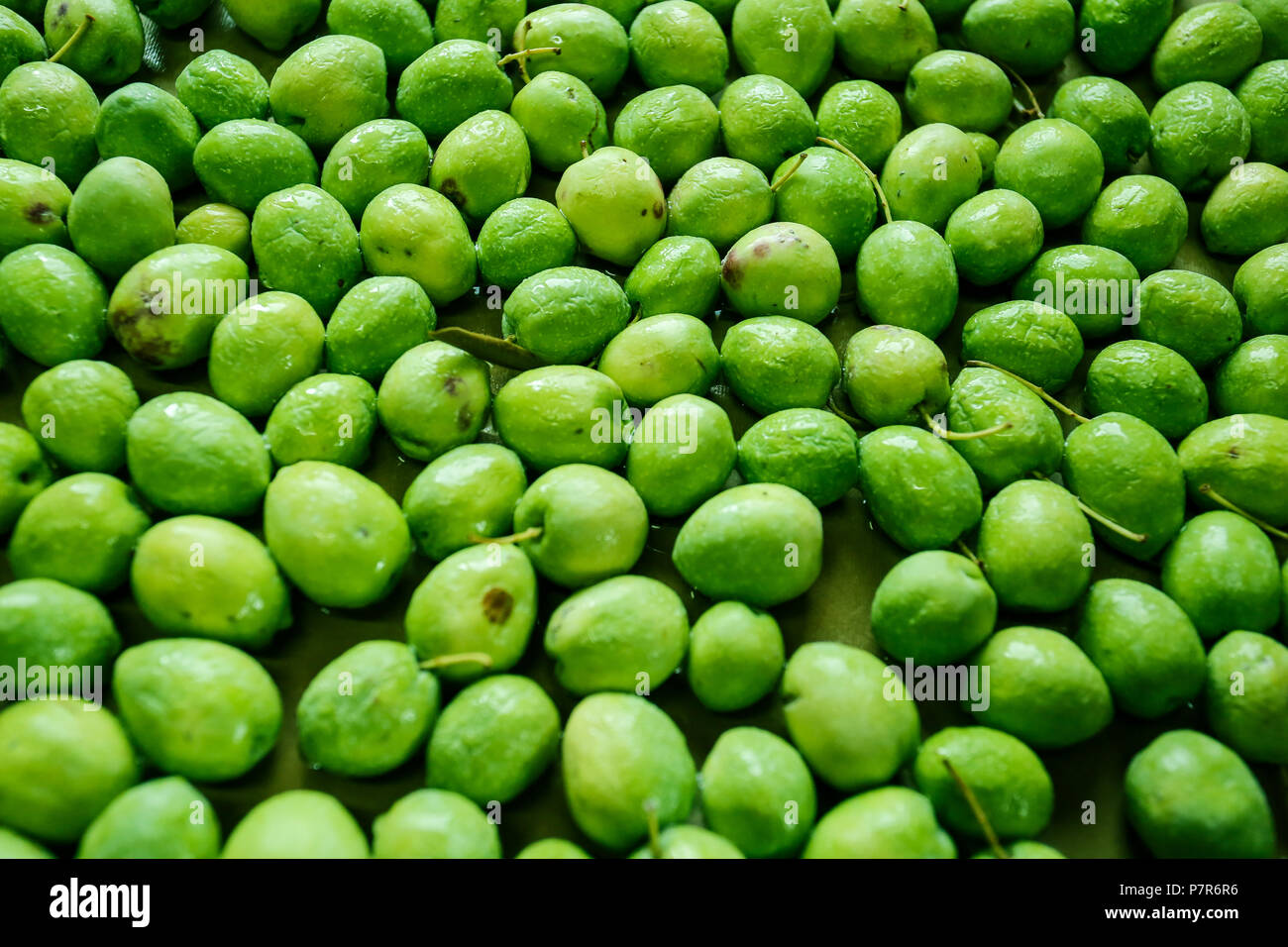 fresh raw green olives Stock Photo - Alamy