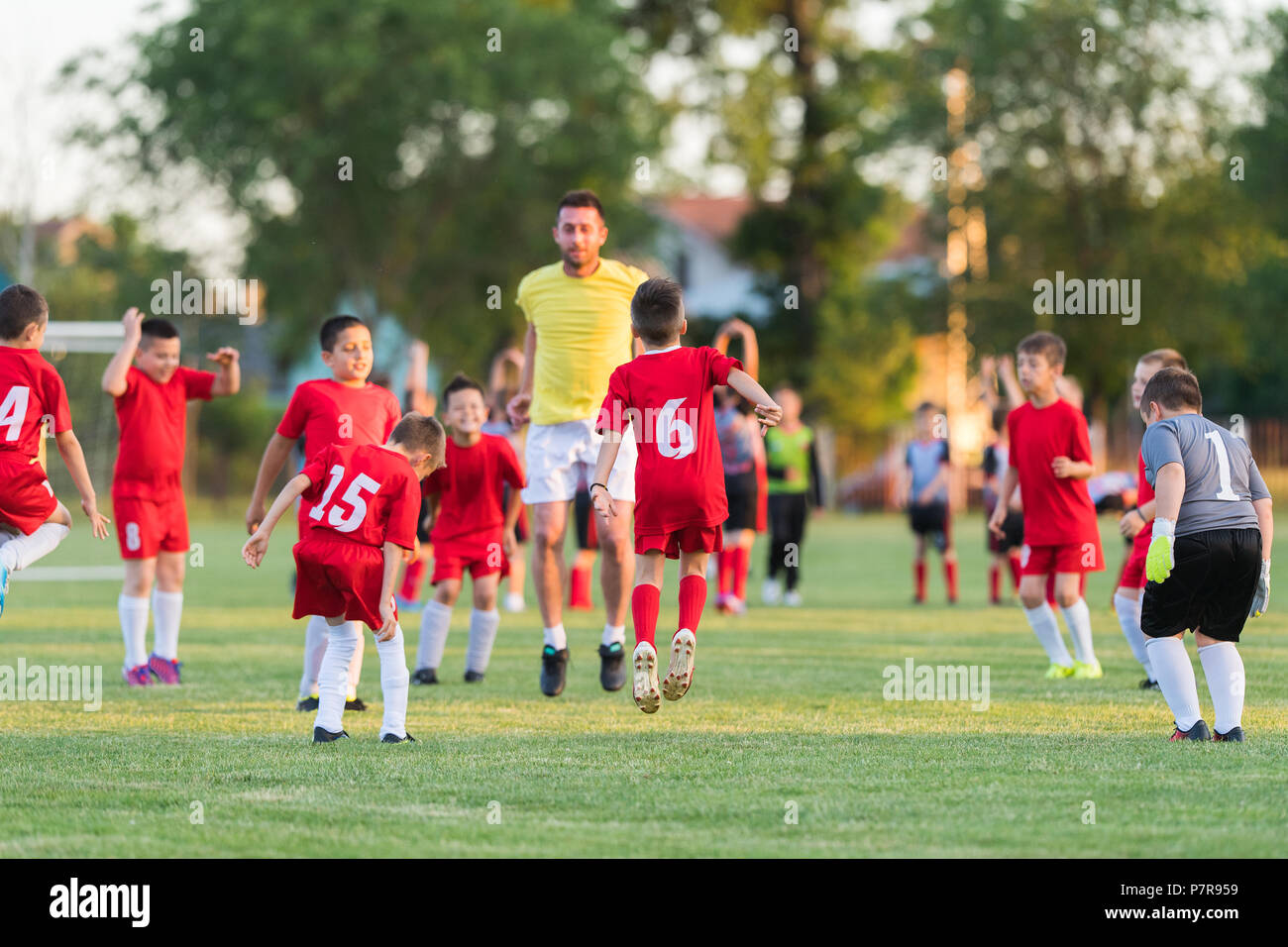 Kids soccer football - small children players exercising before match ...