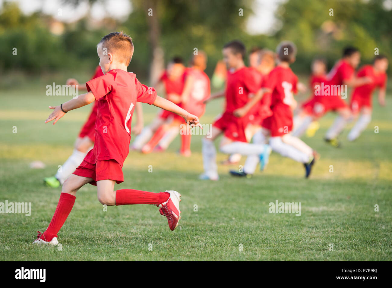 Kids soccer football - small children players exercising before match ...