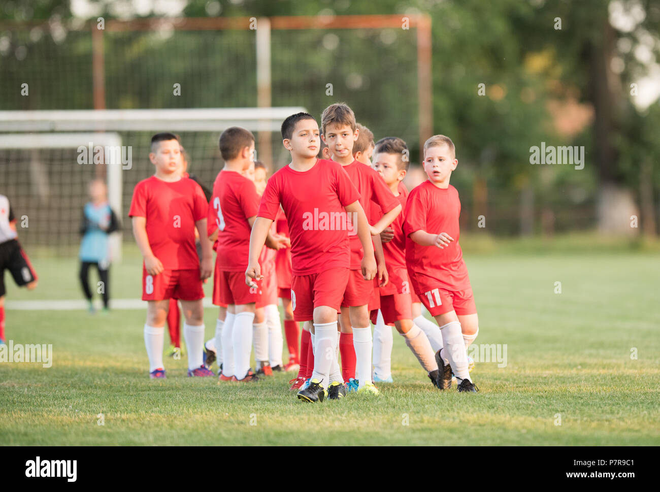 Kids soccer football - small children players exercising before match ...