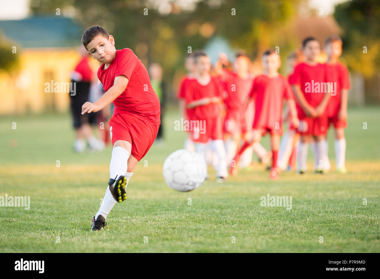 Kids soccer football - young children players match on soccer field ...