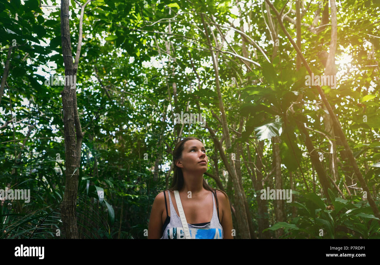 Woman walking through the rainforest hi-res stock photography and ...