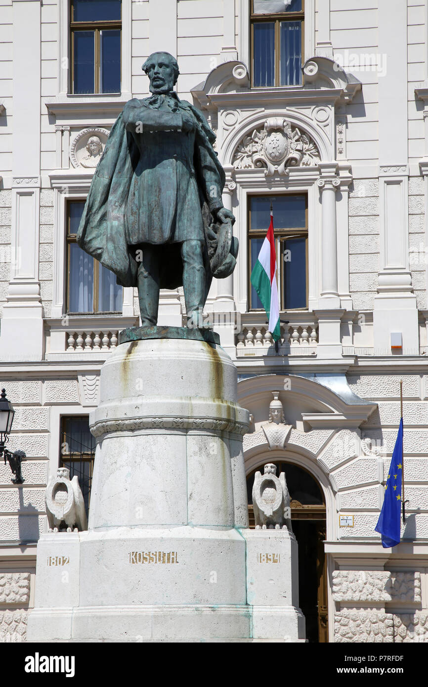 Statue of Lajos Kossuth and governmental building in Pecs, Hungary ...