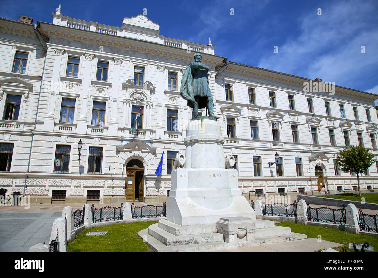 Statue of Lajos Kossuth and governmental building in Pecs, Hungary ...