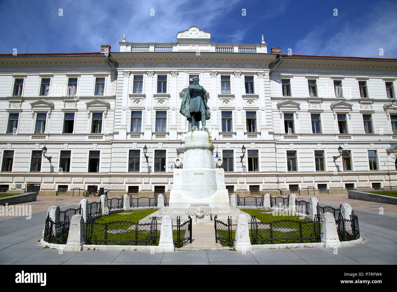 Statue of Lajos Kossuth and governmental building in Pecs, Hungary ...