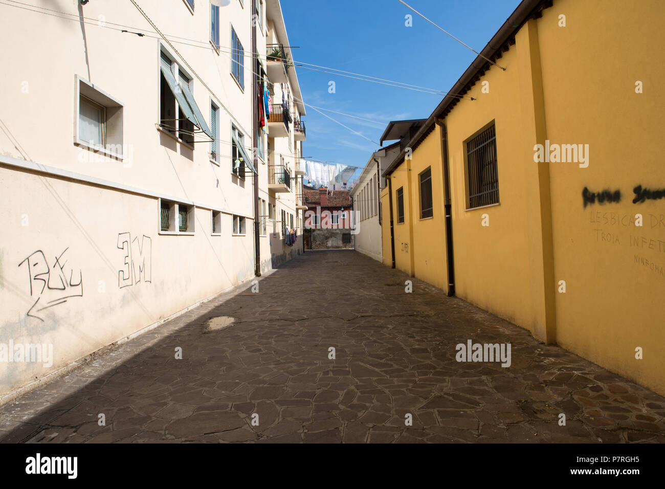 Buildings in a small street of Venice, Italy Stock Photo - Alamy