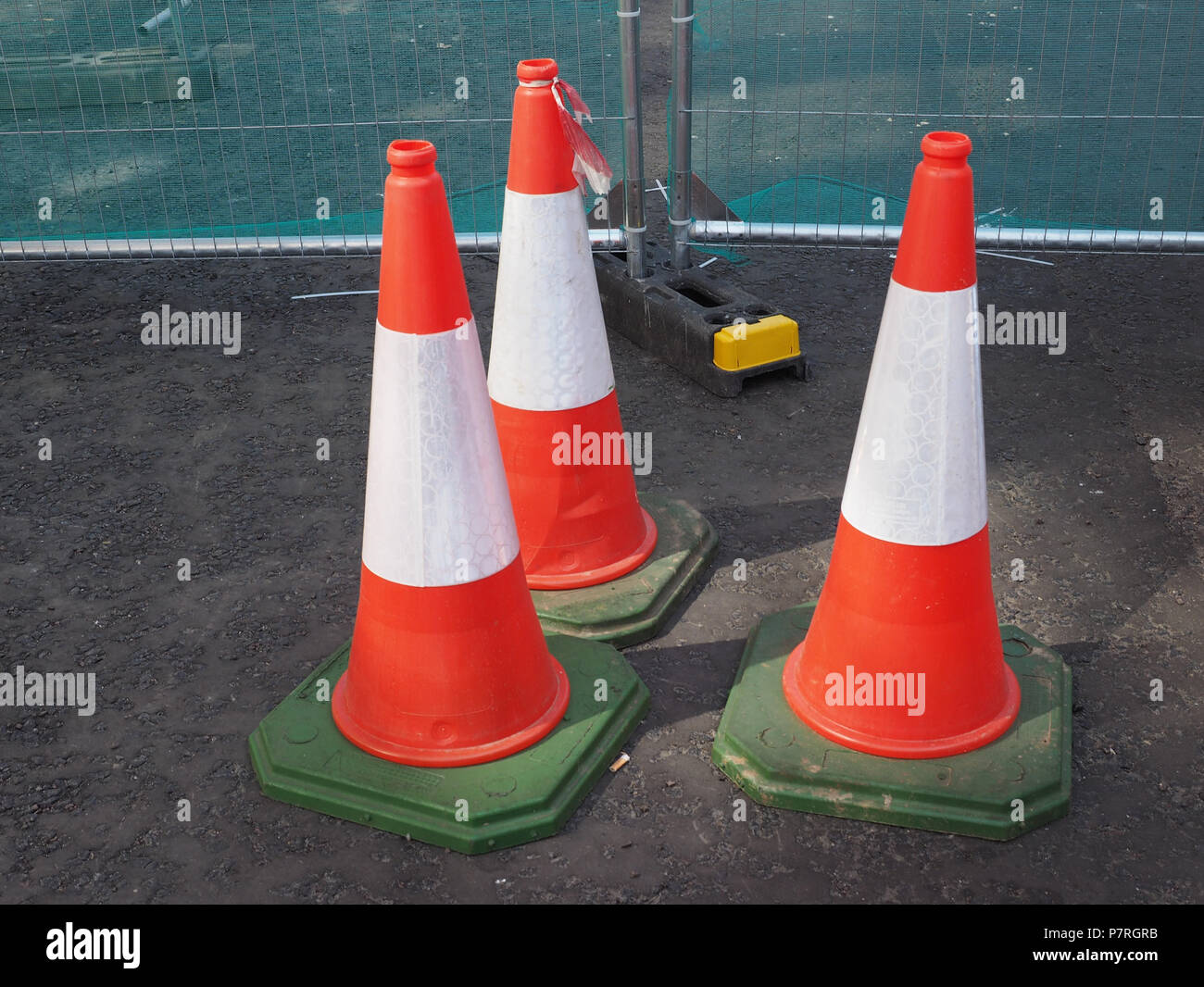 traffic cone to mark road works or temporary obstruction traffic sign ...
