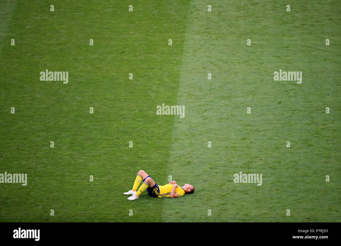 Sweden's Viktor Claesson lies dejected after the FIFA World Cup ...