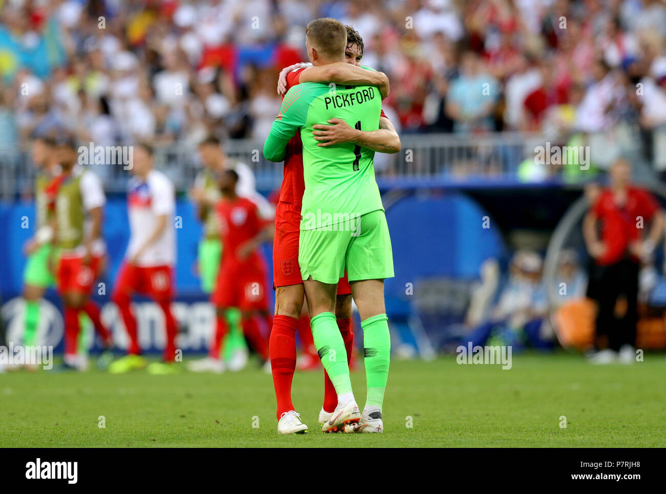 England goalkeeper Jordan Pickford (right) and John Stones celebrate ...