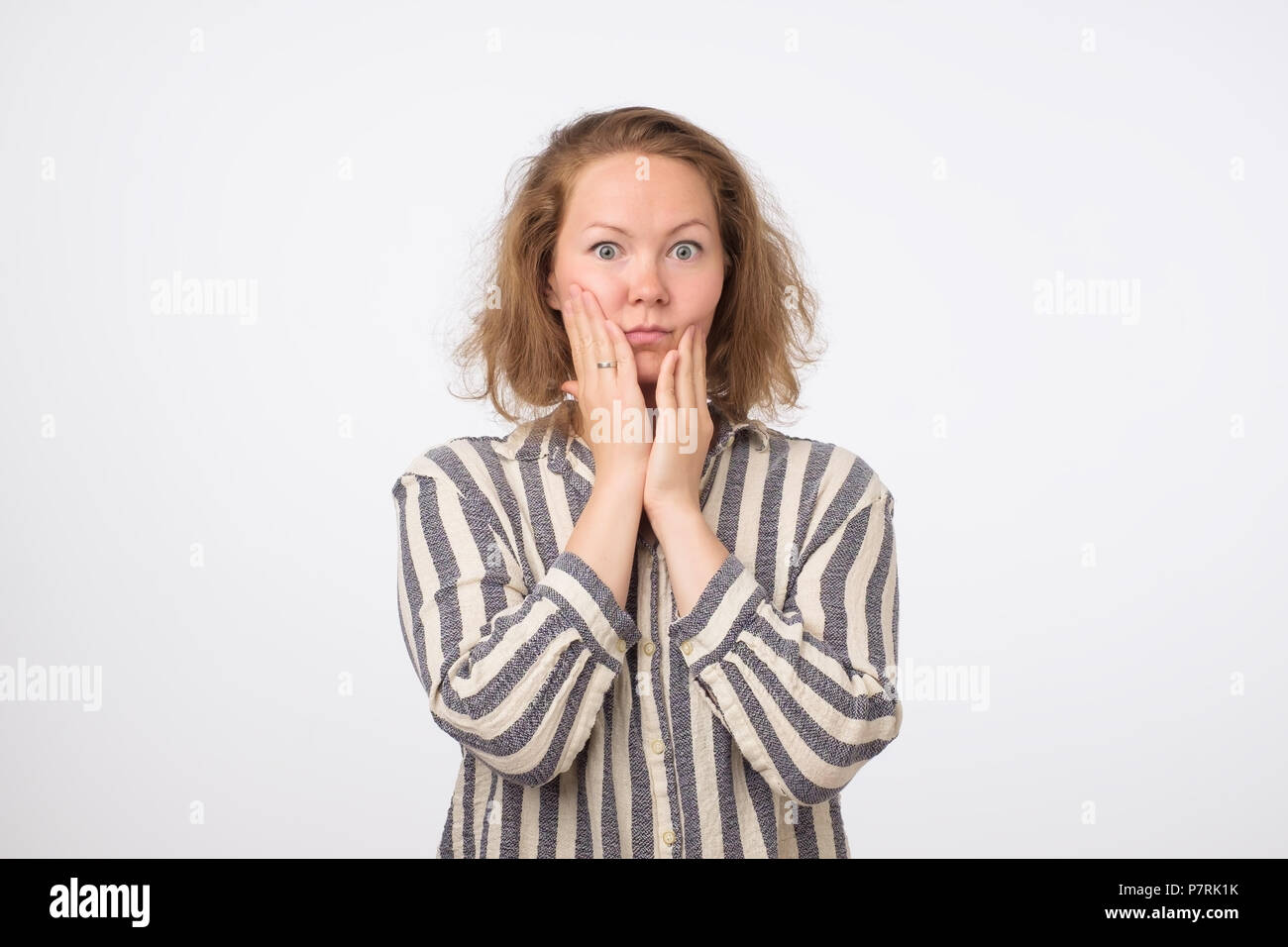Young sad woman serious and concerned looking worried and thoughtful ...