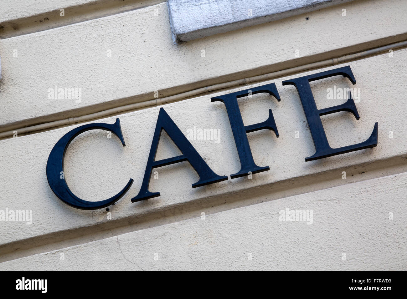 Cafe Sign on Building Wall Stock Photo - Alamy