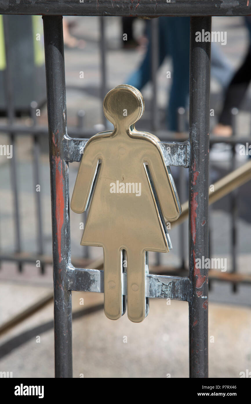 Female Toilet Sign in City Setting Stock Photo - Alamy