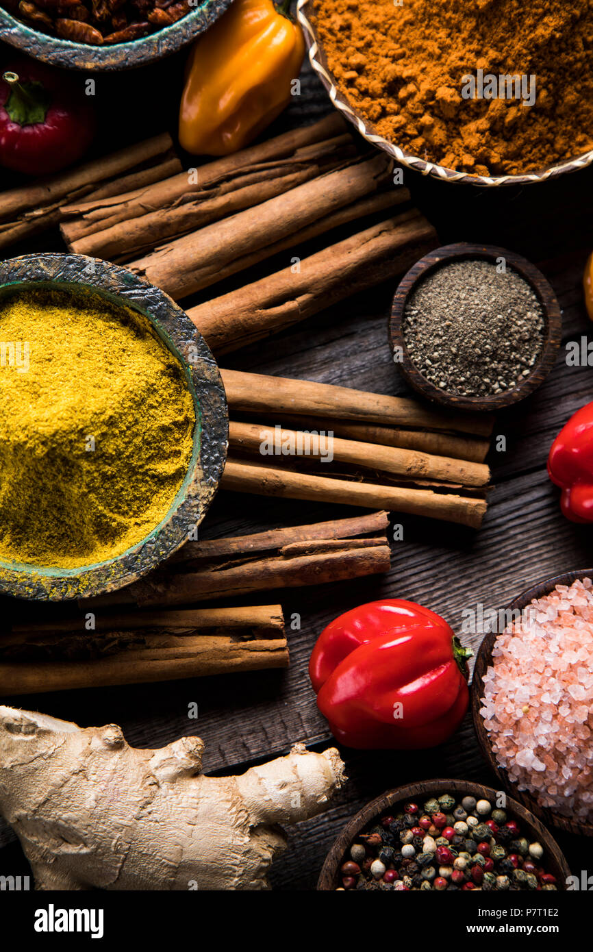 Hot spices in wooden bowls Stock Photo - Alamy
