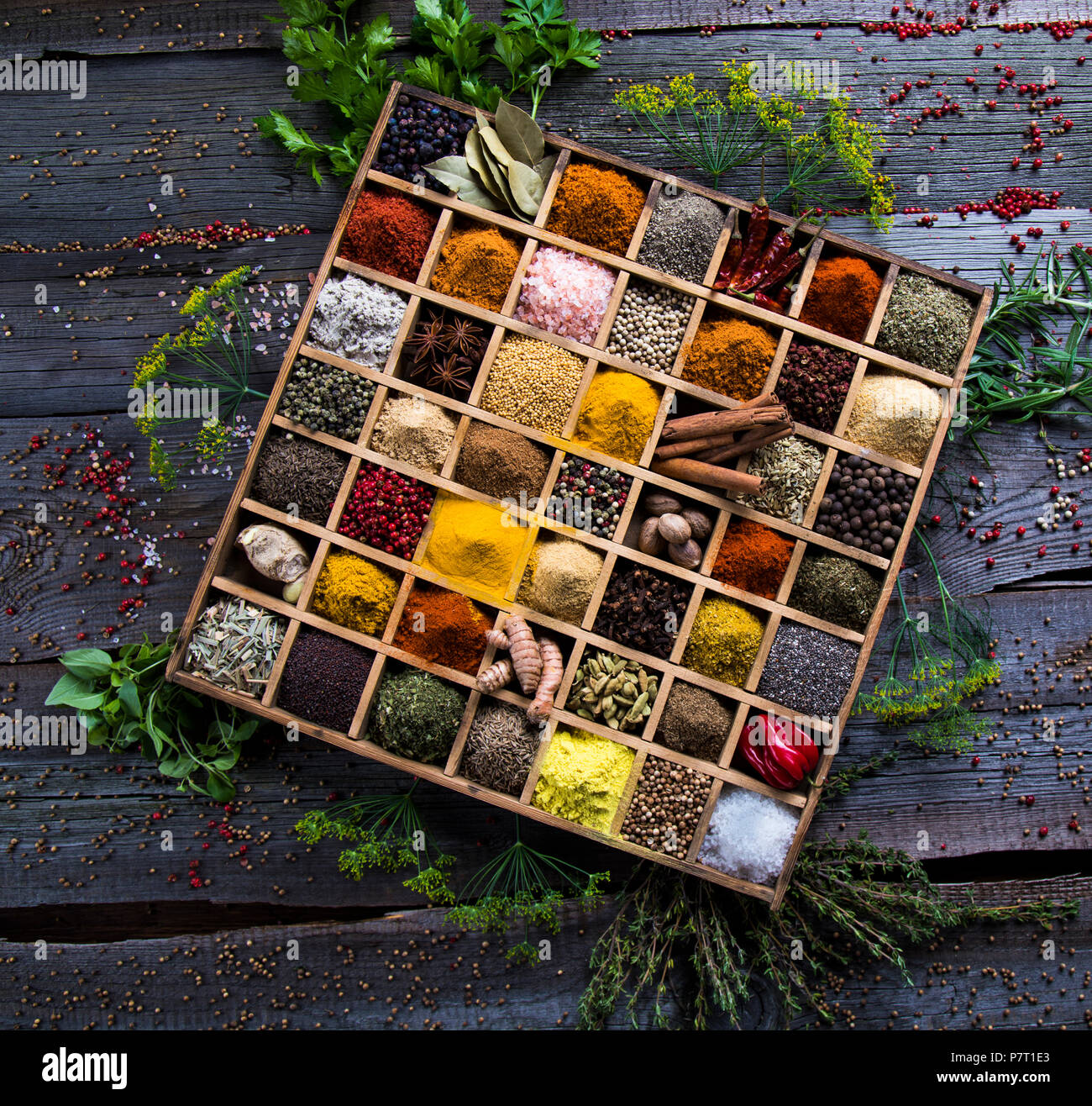 Wooden box with spices and herbs Stock Photo - Alamy