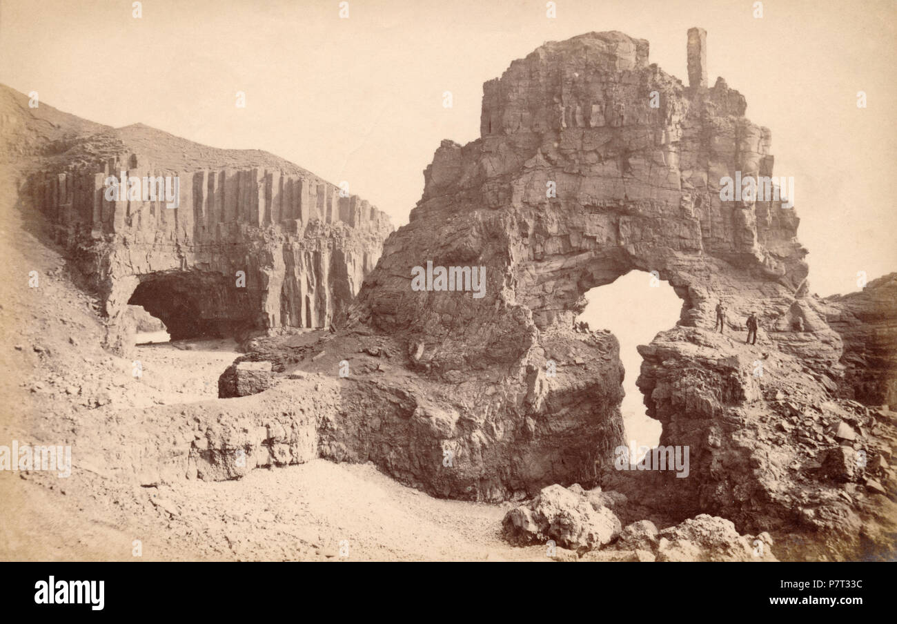 Victorian view of Carsaig Arches, Isle of Mull, 1880, with two men one ...