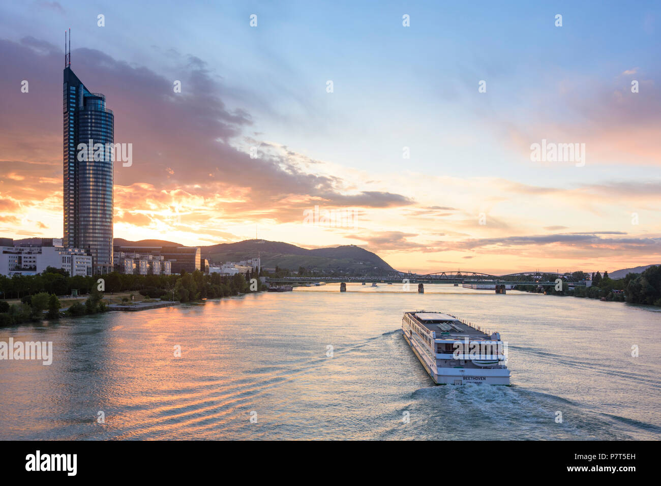 Wien, Vienna: river Danube, Millennium Tower, cruise ship, Wienerwald ...
