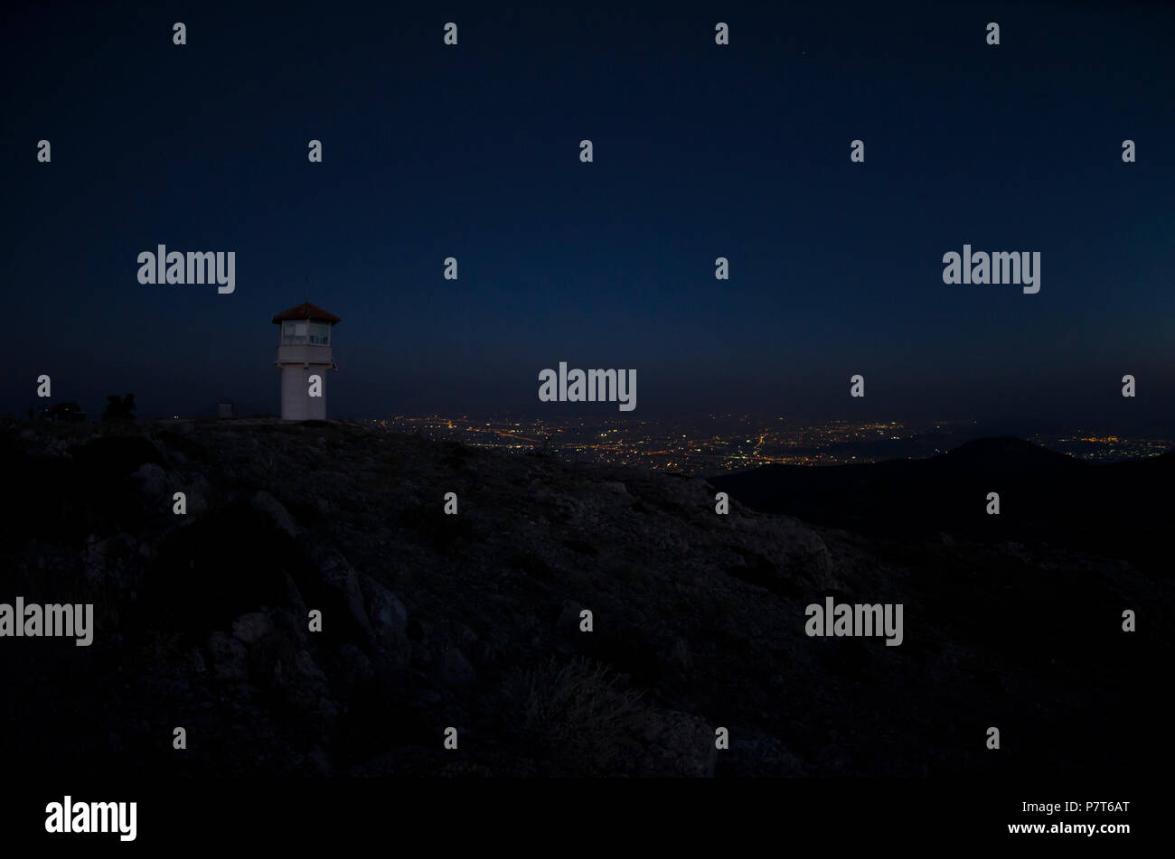 Human silhouette fire lookout station Stock Photo - Alamy