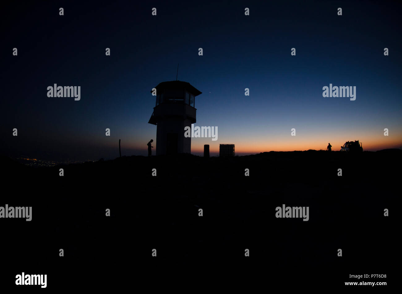 Human silhouette fire lookout station Stock Photo - Alamy