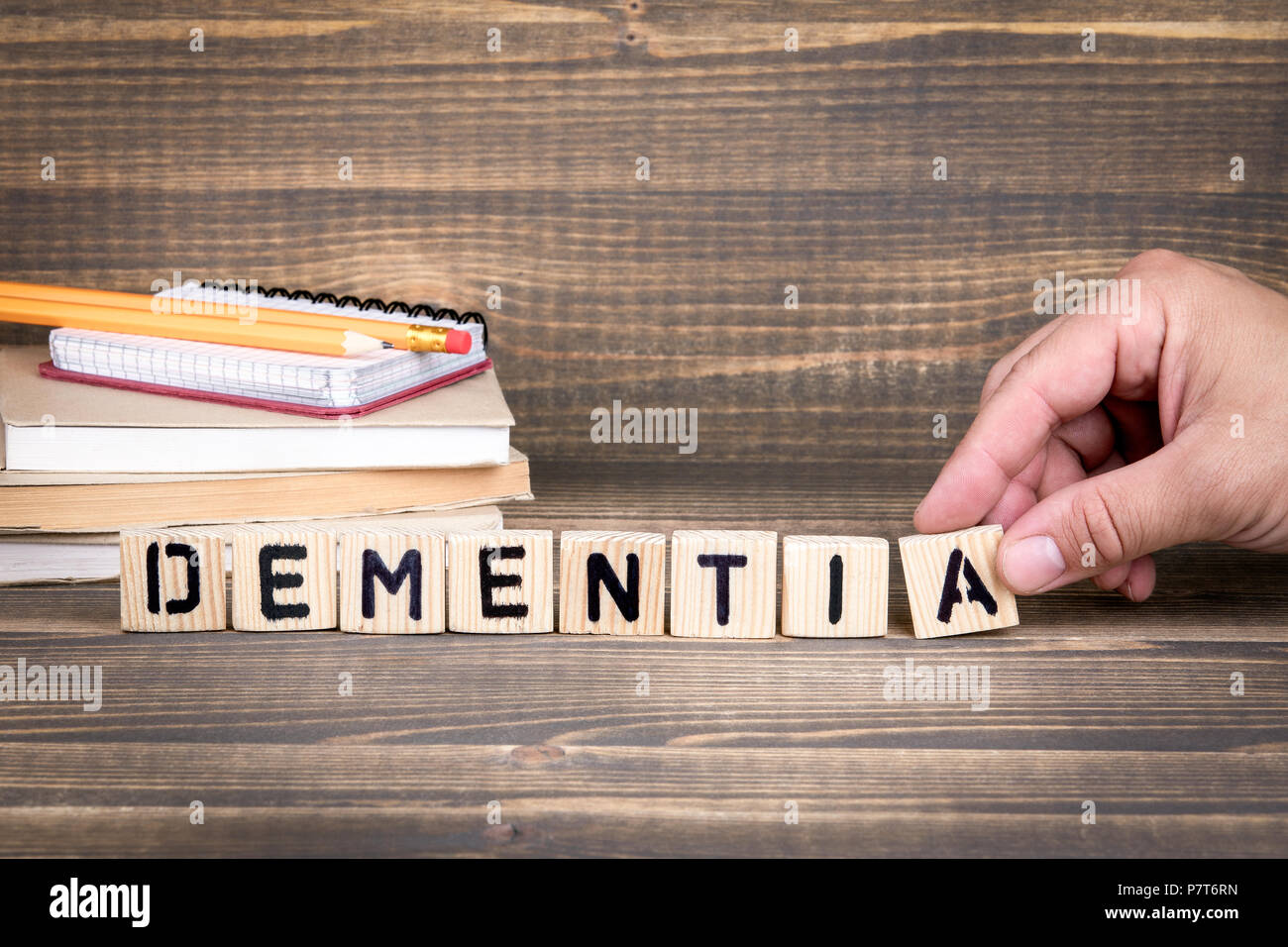 Dementia, Health Care and medical concept. Wooden letters on the office ...