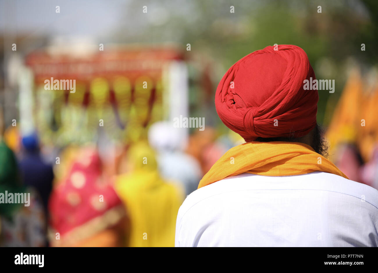 Sikh man with red turban an important religiuos symbol for this culture ...
