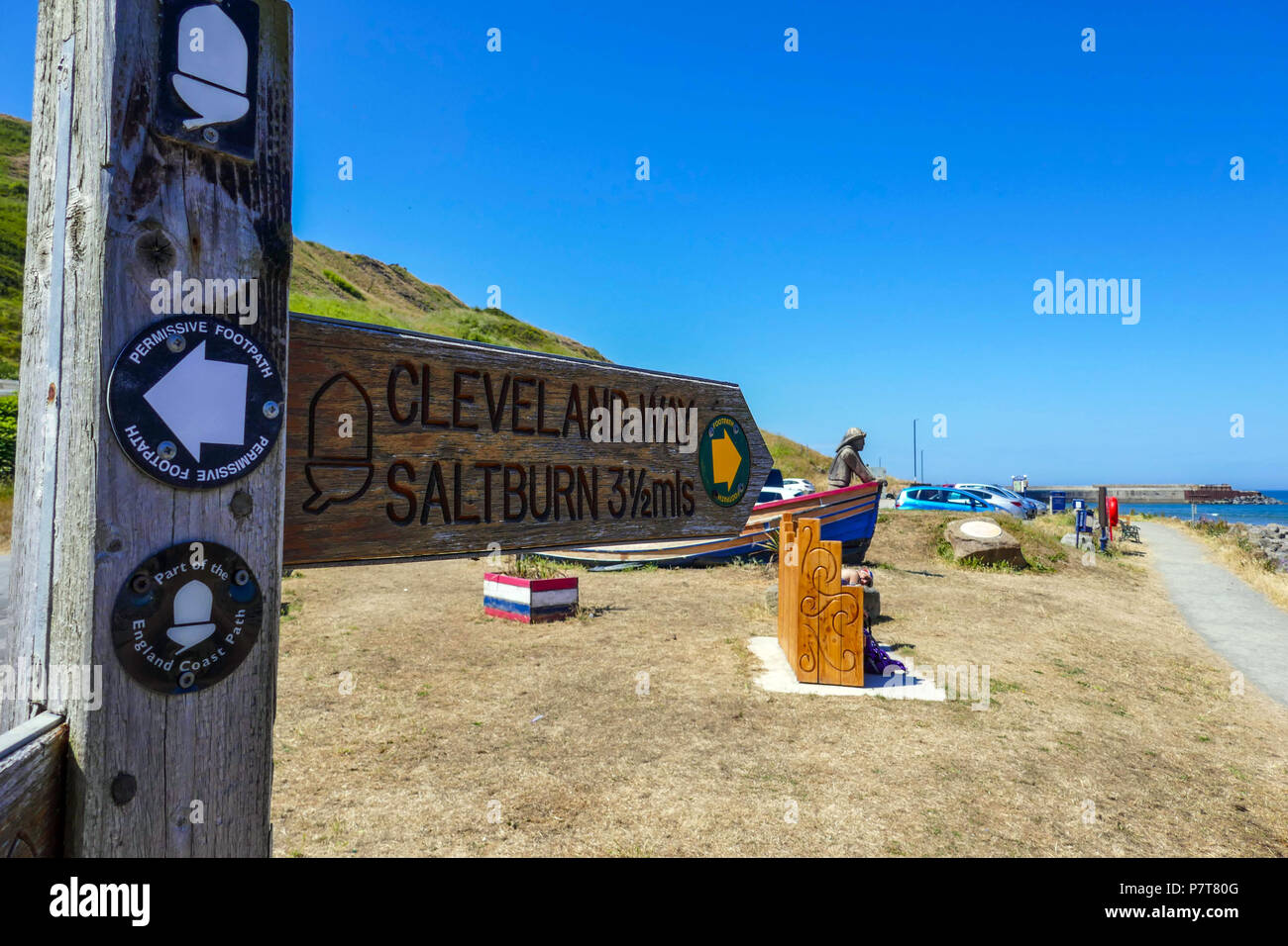 Cleveland Way, sign, hot blue summer day as the seaside town of ...
