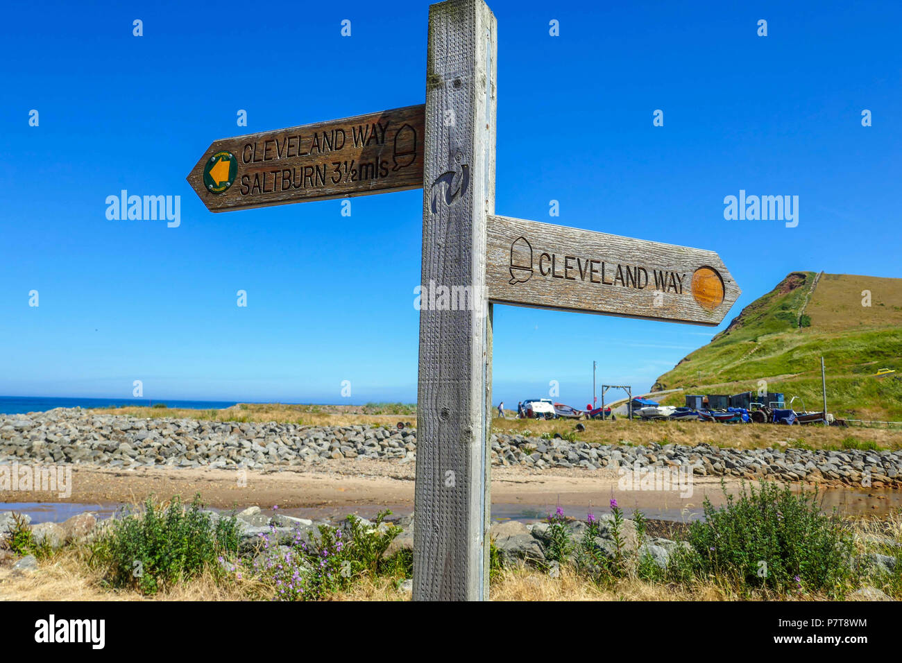 Cleveland Way, sign, hot blue summer day as seaside town of ...
