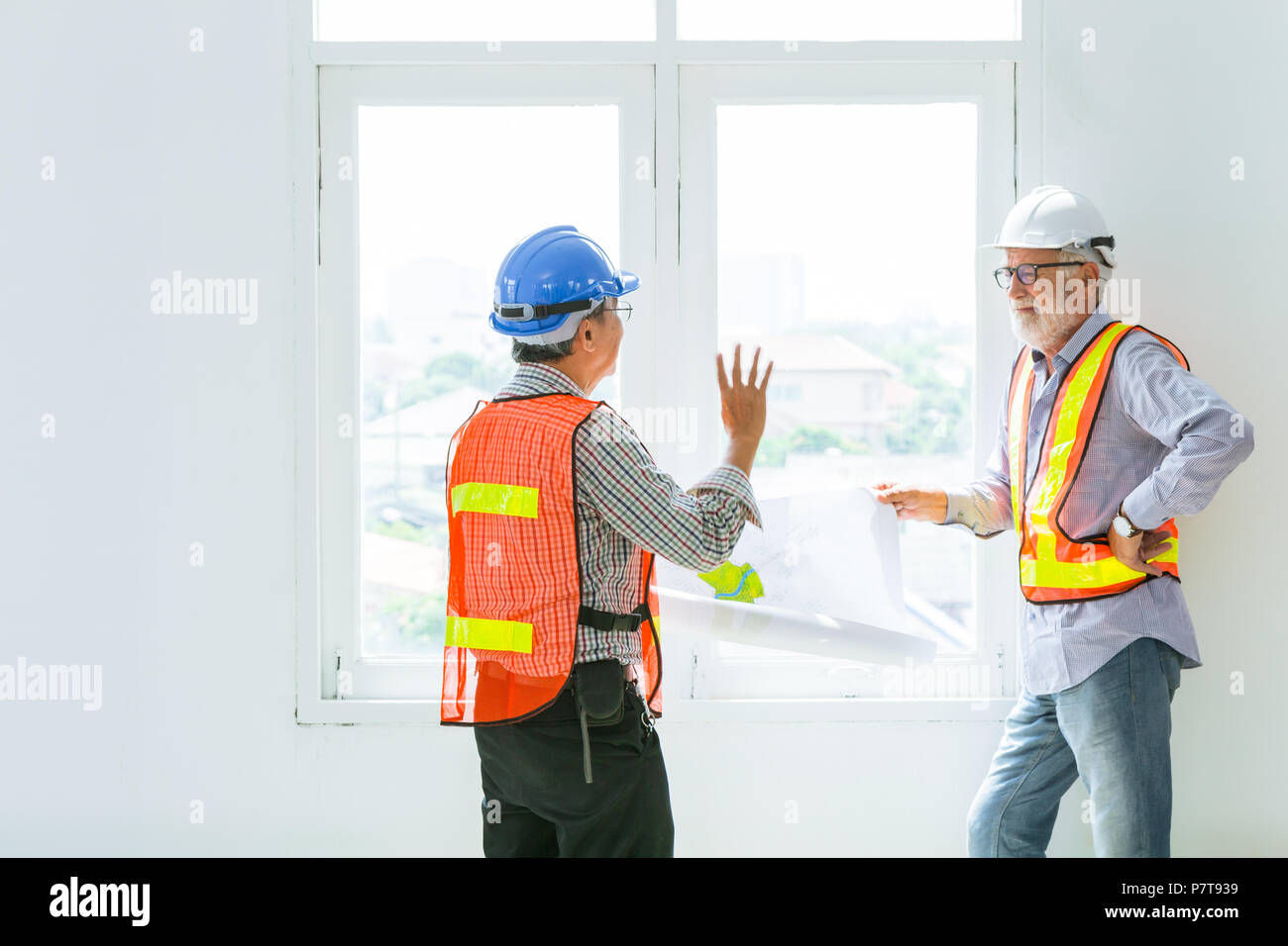 mix race senior construction engineers worker talking together about ...