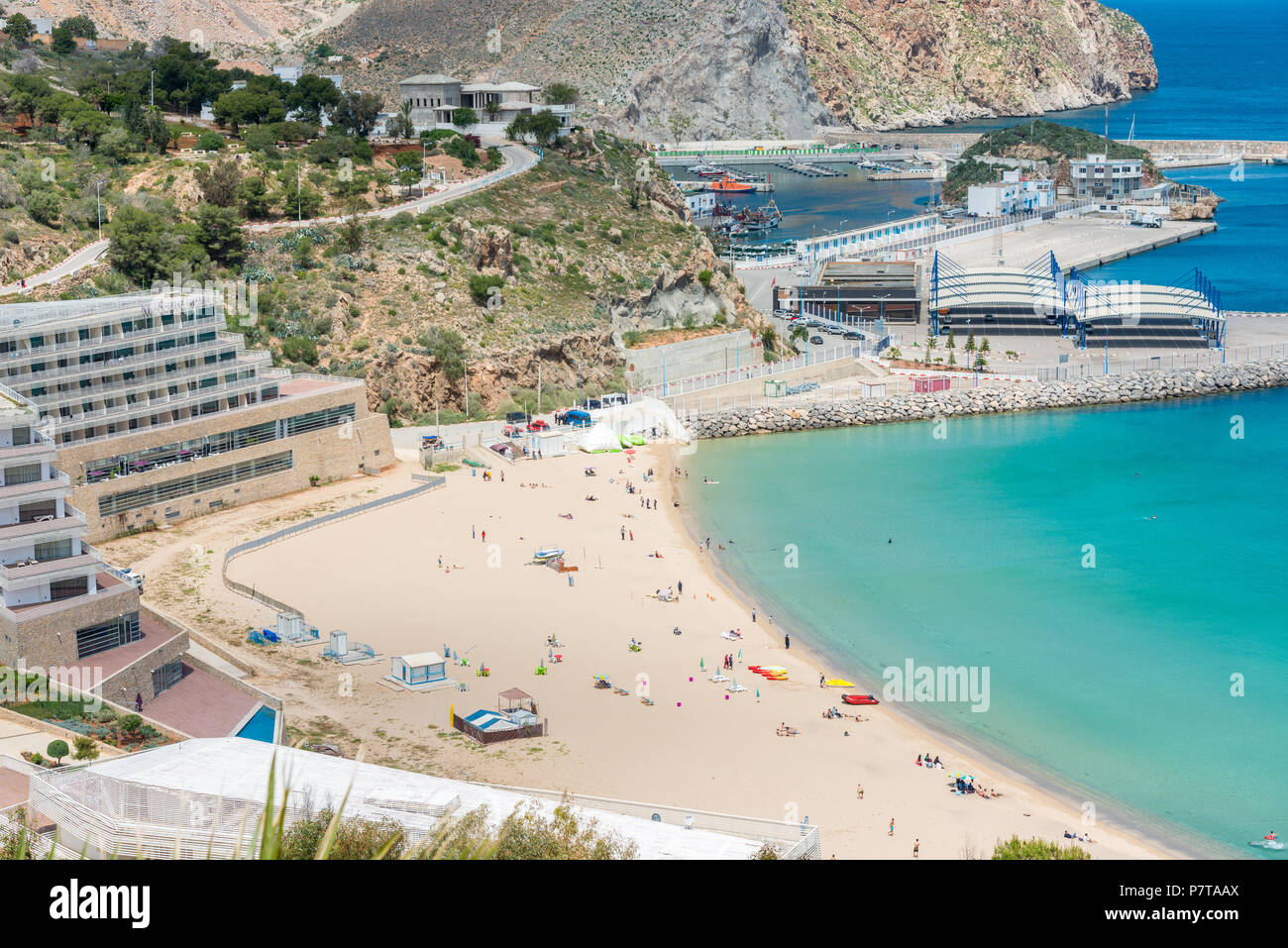 Aerial view of the Quemado beach full of people in Al Hoceima, Morocco ...