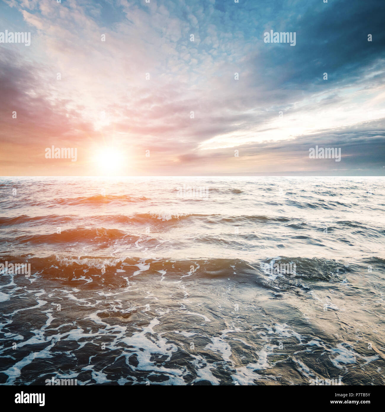Tropical ocean sunrise Stock Photo - Alamy