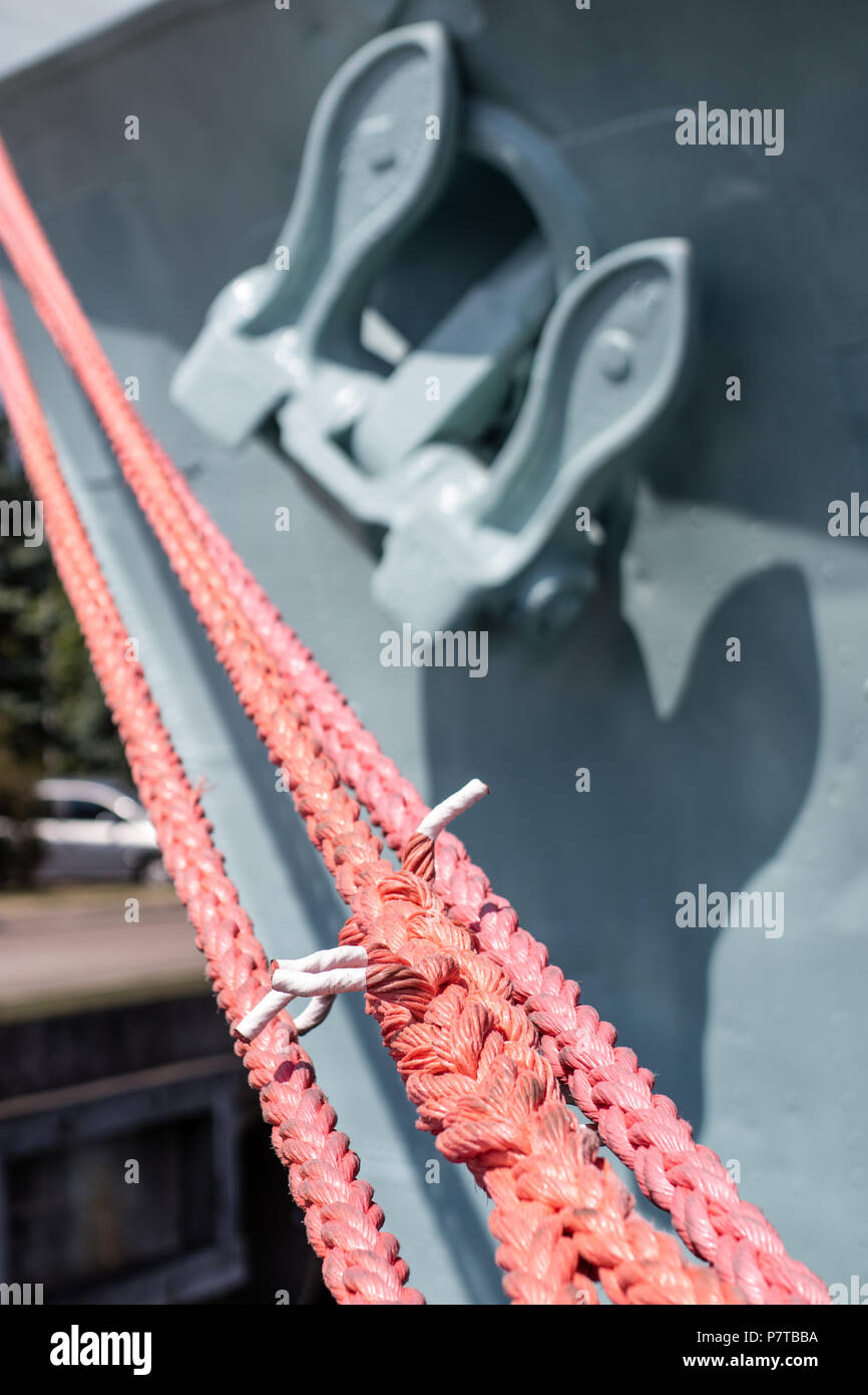 Ship anchor suspended on the side. Port in central europe. Season of ...