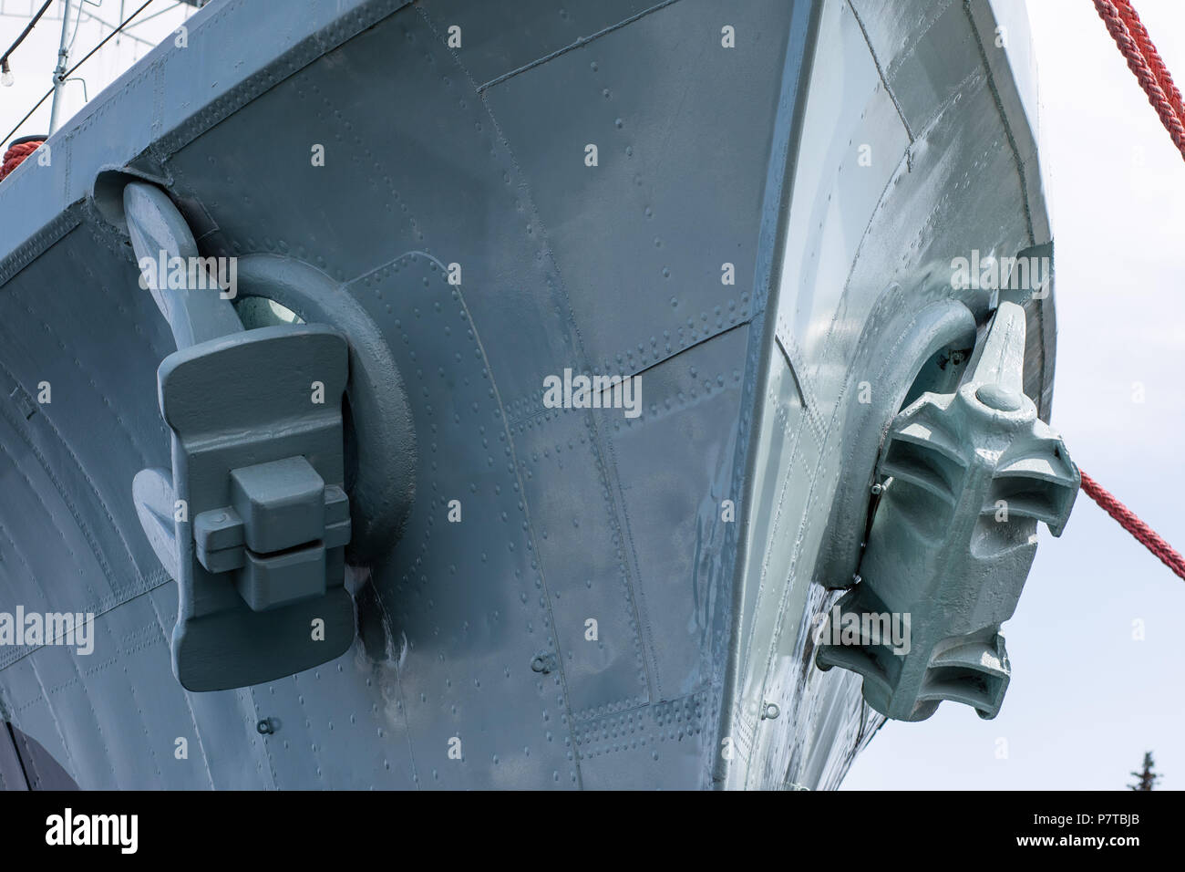 Ship anchor suspended on the side. Port in central europe. Season of ...