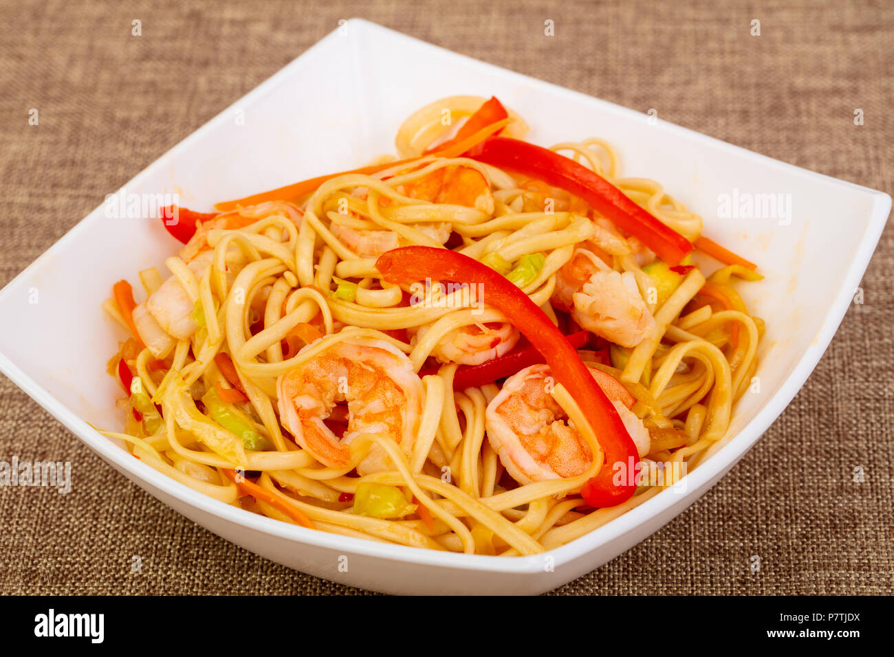 Wok noodle with prawn, vegetables and spices Stock Photo - Alamy