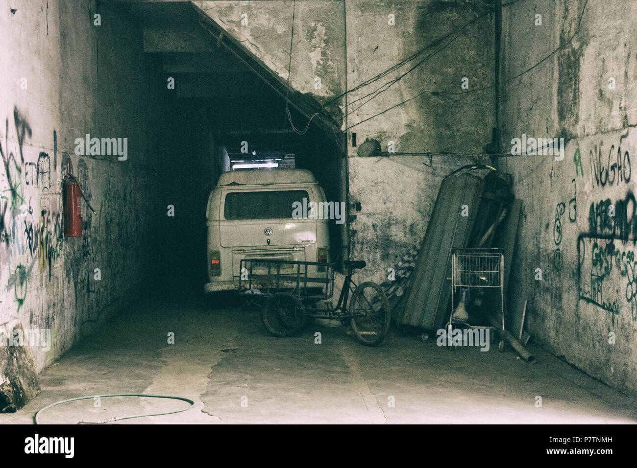 Old microbus, a carrying bike and a supermarket trolley parked in ...