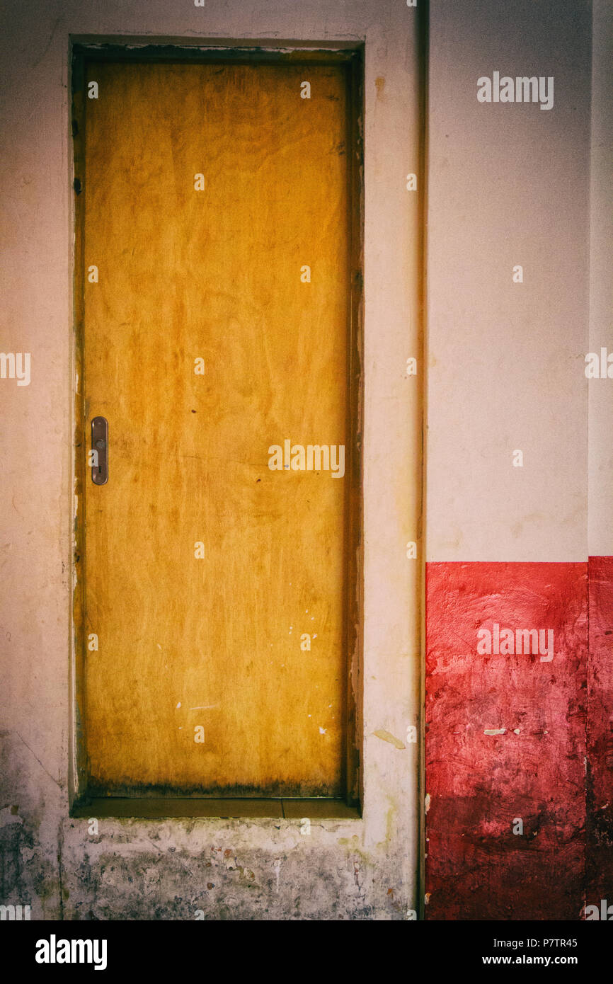 Wood door with giant step Stock Photo - Alamy