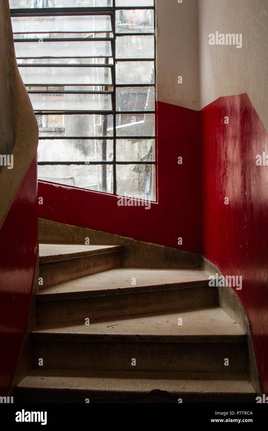 Concrete staircase with window Stock Photo - Alamy