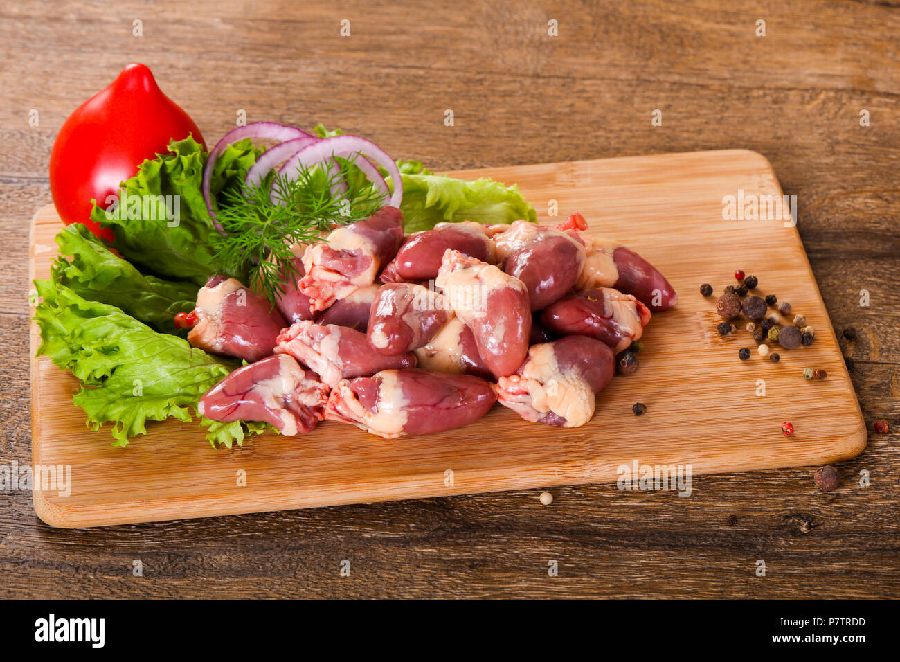 Raw chicken hearts for cooking Stock Photo - Alamy