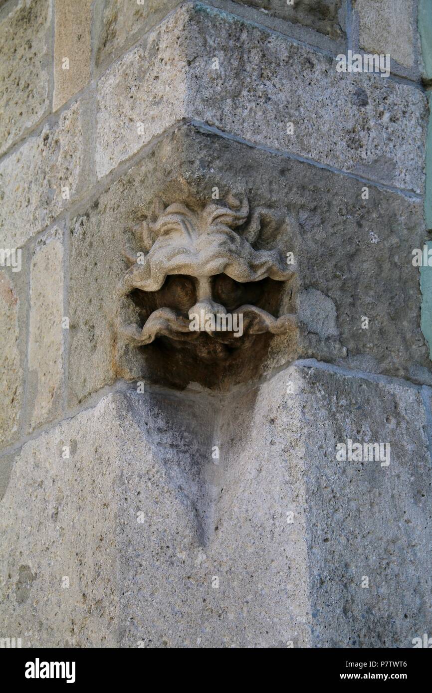 Face to ward off evil in Europe, built into the buildings corner Stock ...