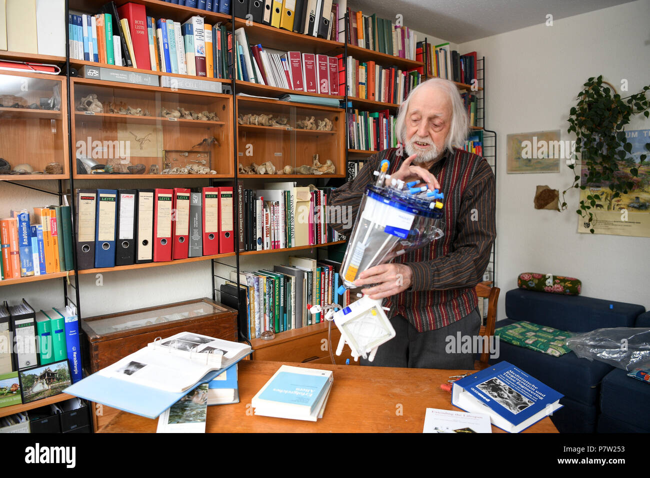 Germany, Senden. 25th June, 2018. Age researcher Klaus Sames holds his ...